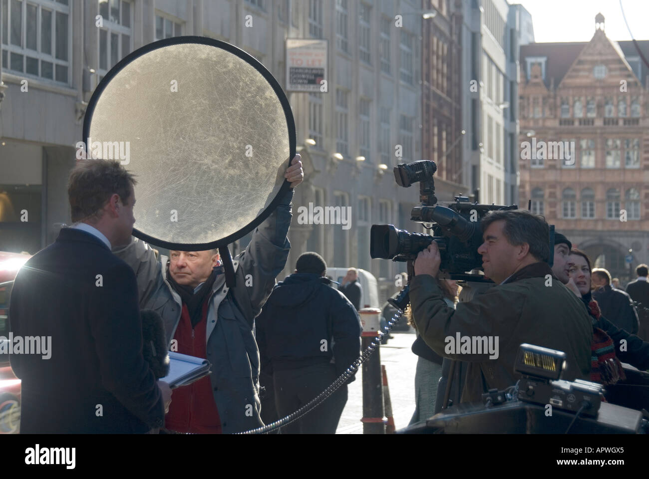 News reporters interviewing criminal hi-res stock photography and ...