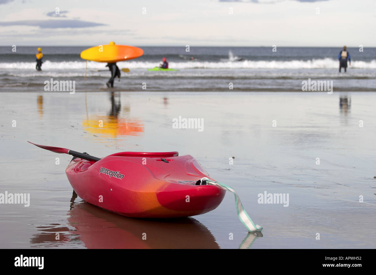 Red Perception Kayak on beach Moray Firth Scotland Stock Photo - Alamy