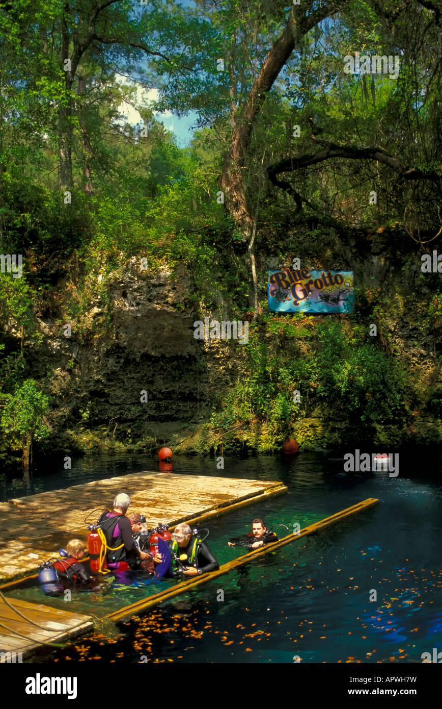 scuba divers on platform blue grotto spring cavern Florida fresh water ...