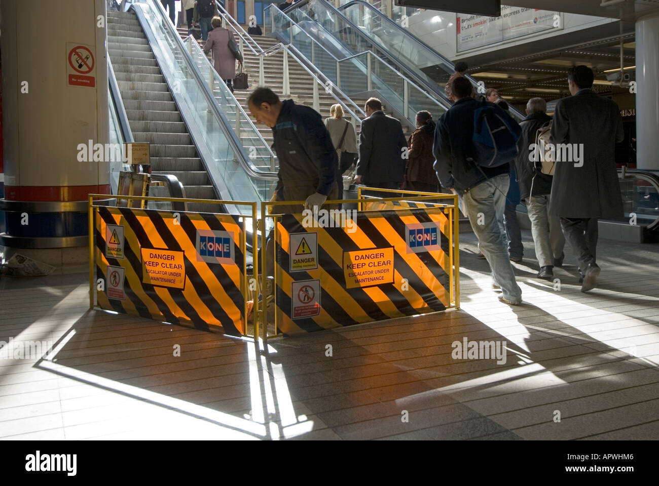 Men at work Liverpool Street railway train station building escalator ...