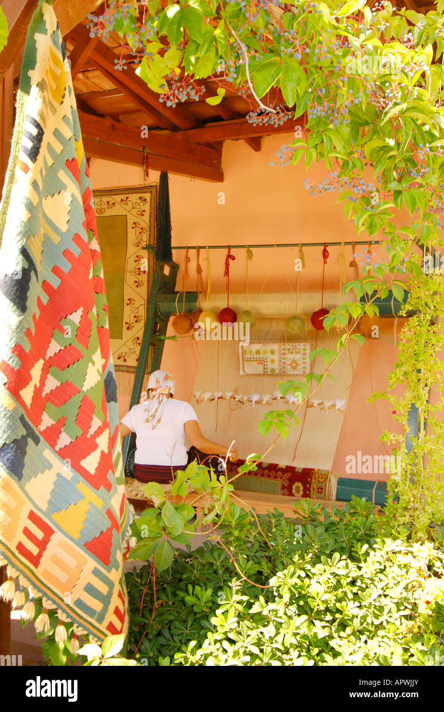 Turkish woman weaving rug at loom, Datca Peninsula, Turkey Stock Photo ...