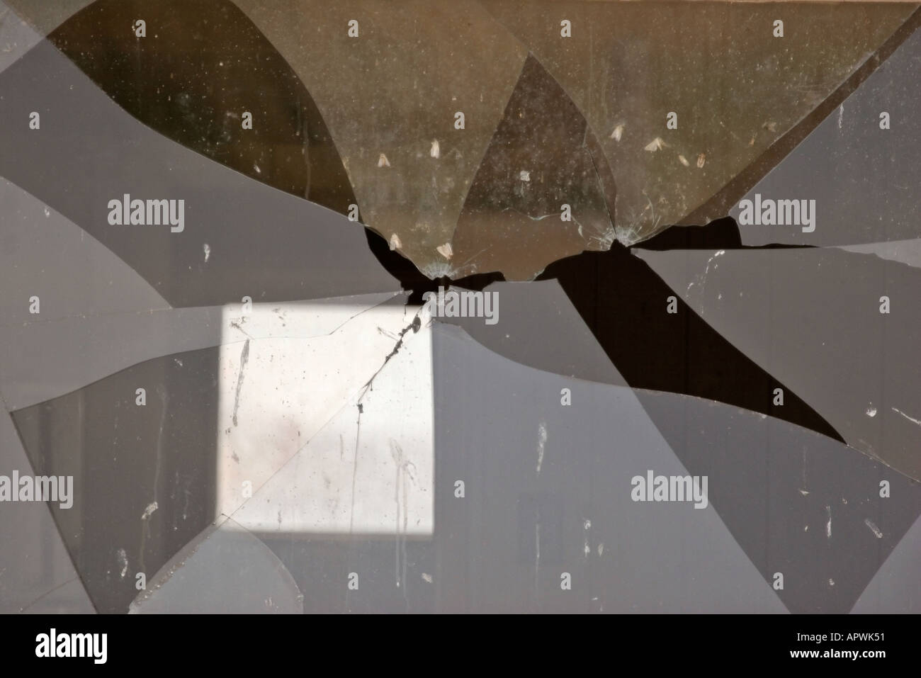 Patterns of a broken two pane window in scenic Southern Saskatchewan ...