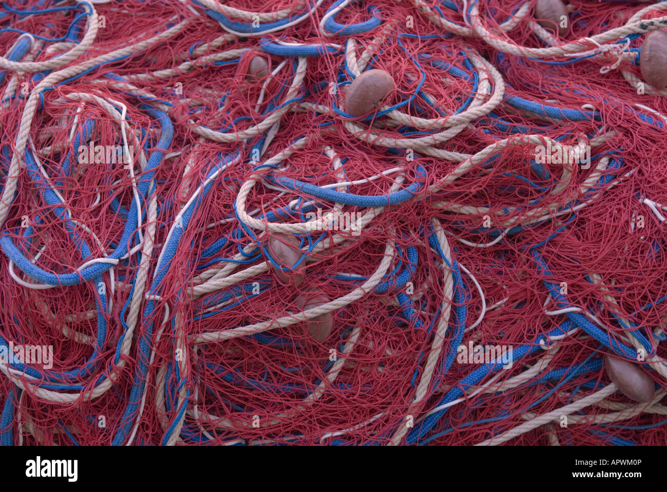 Red Fishing nets with Blue and White Ropes Stock Photo - Alamy