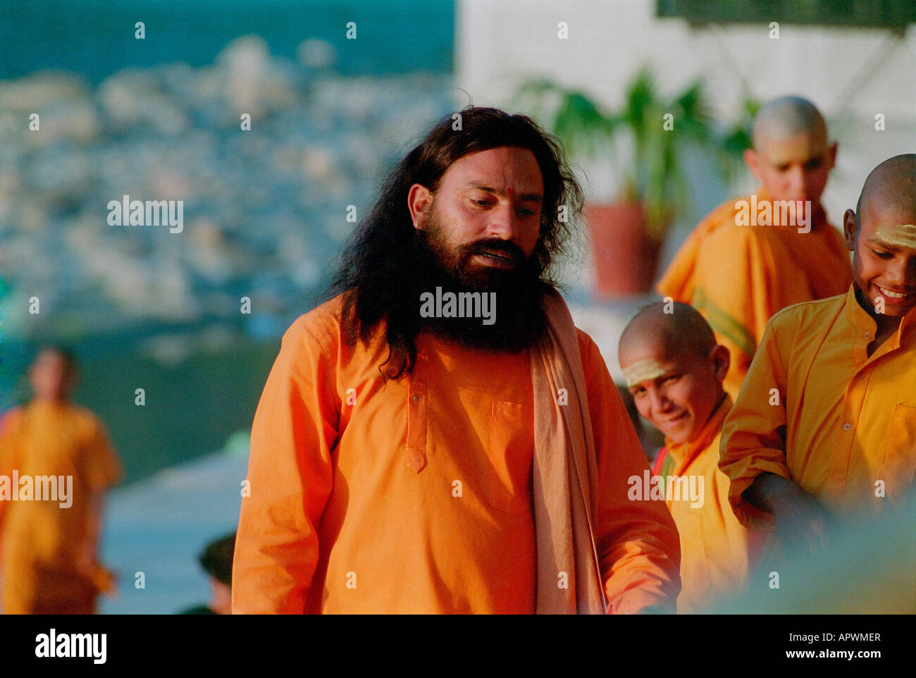 An Indian holy guru and religious leader with disciples Stock Photo - Alamy