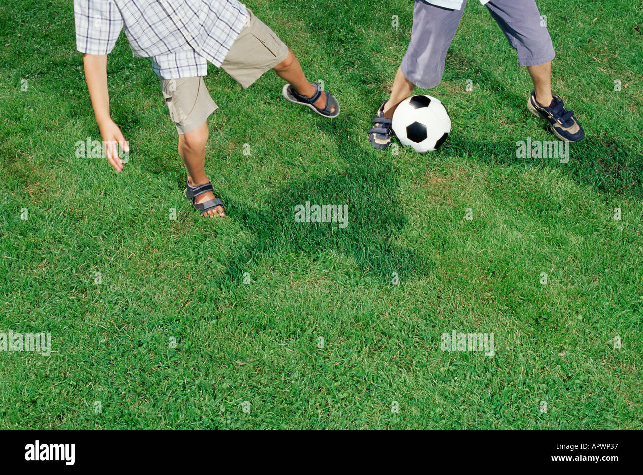 Youths playing football hi-res stock photography and images - Alamy