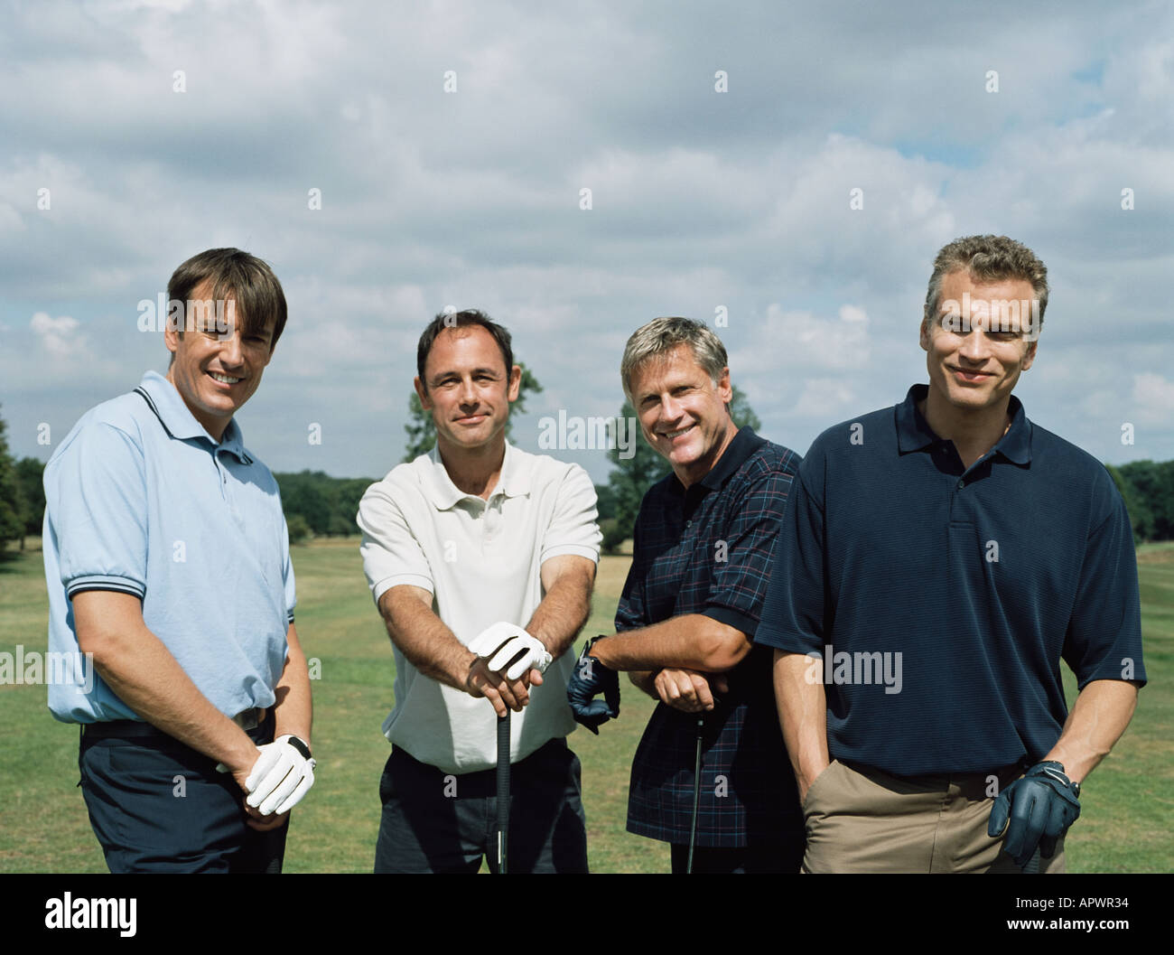 Four golfers hi-res stock photography and images - Alamy
