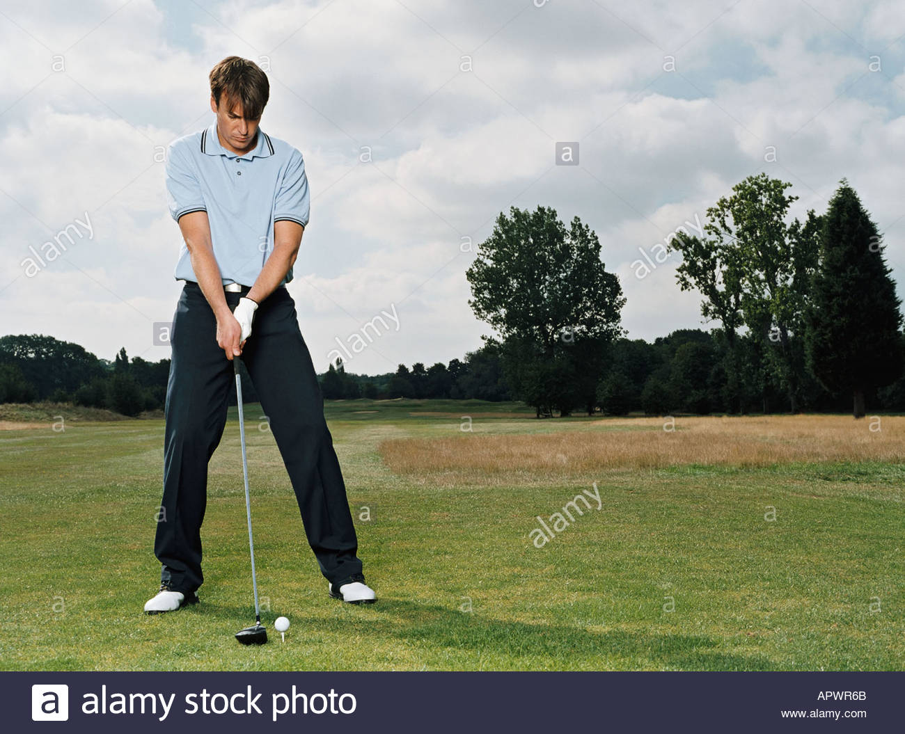 Golfer Teeing Off Stock Photos & Golfer Teeing Off Stock Images - Alamy