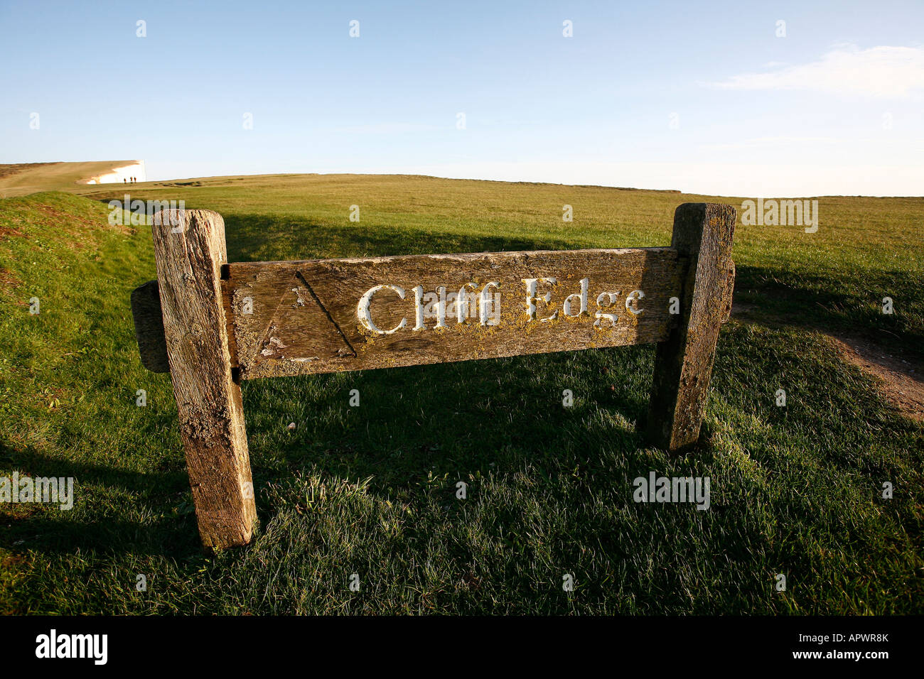 Cliff Edge sign on top of cliffs at Beachy Head near Eastbourne West ...