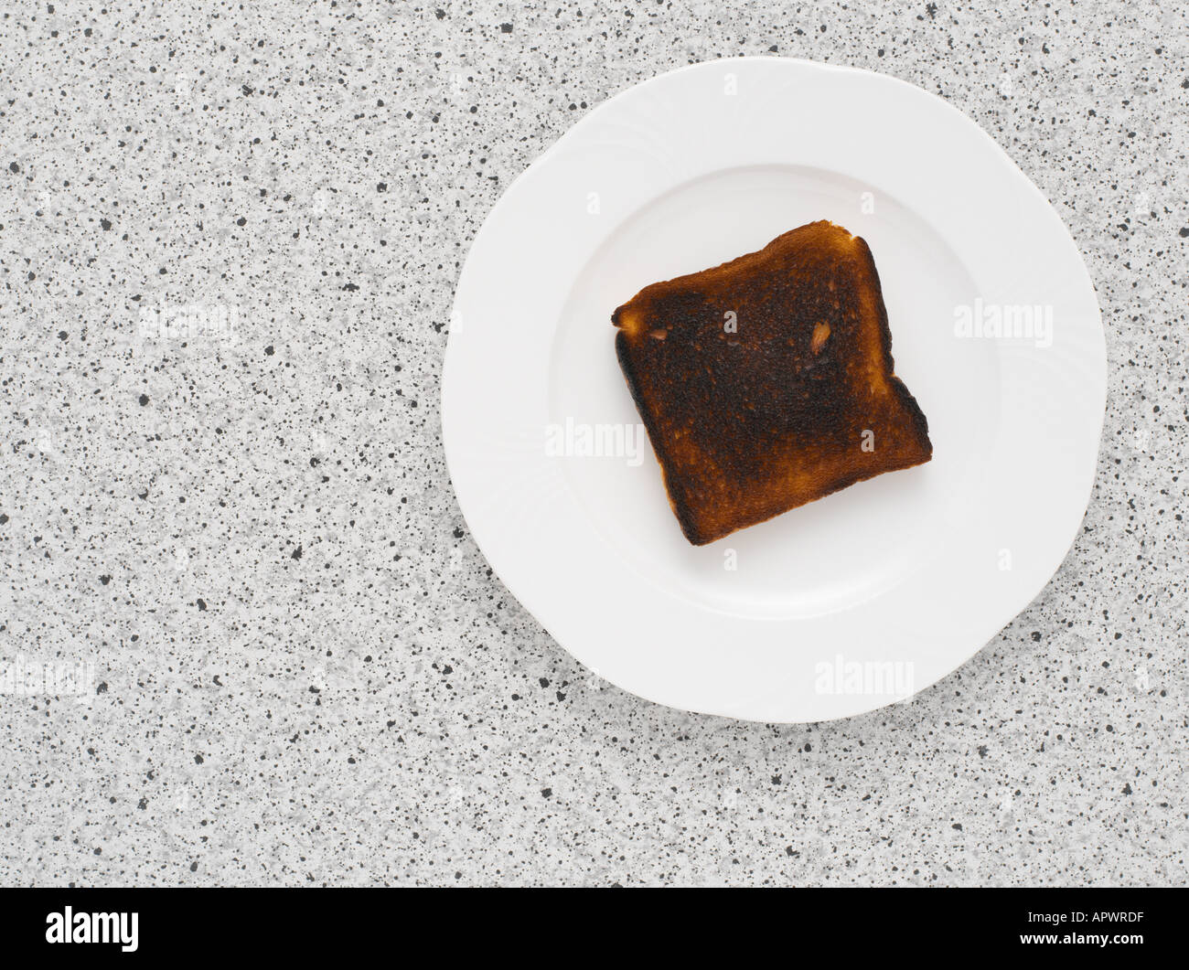 A slice of burnt toast Stock Photo - Alamy