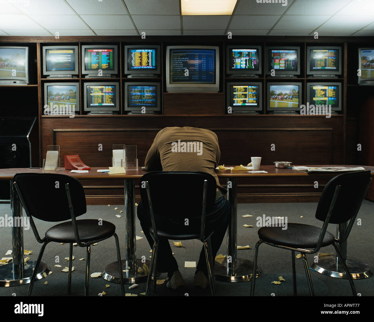 Man and slumped and chair hi-res stock photography and images - Alamy