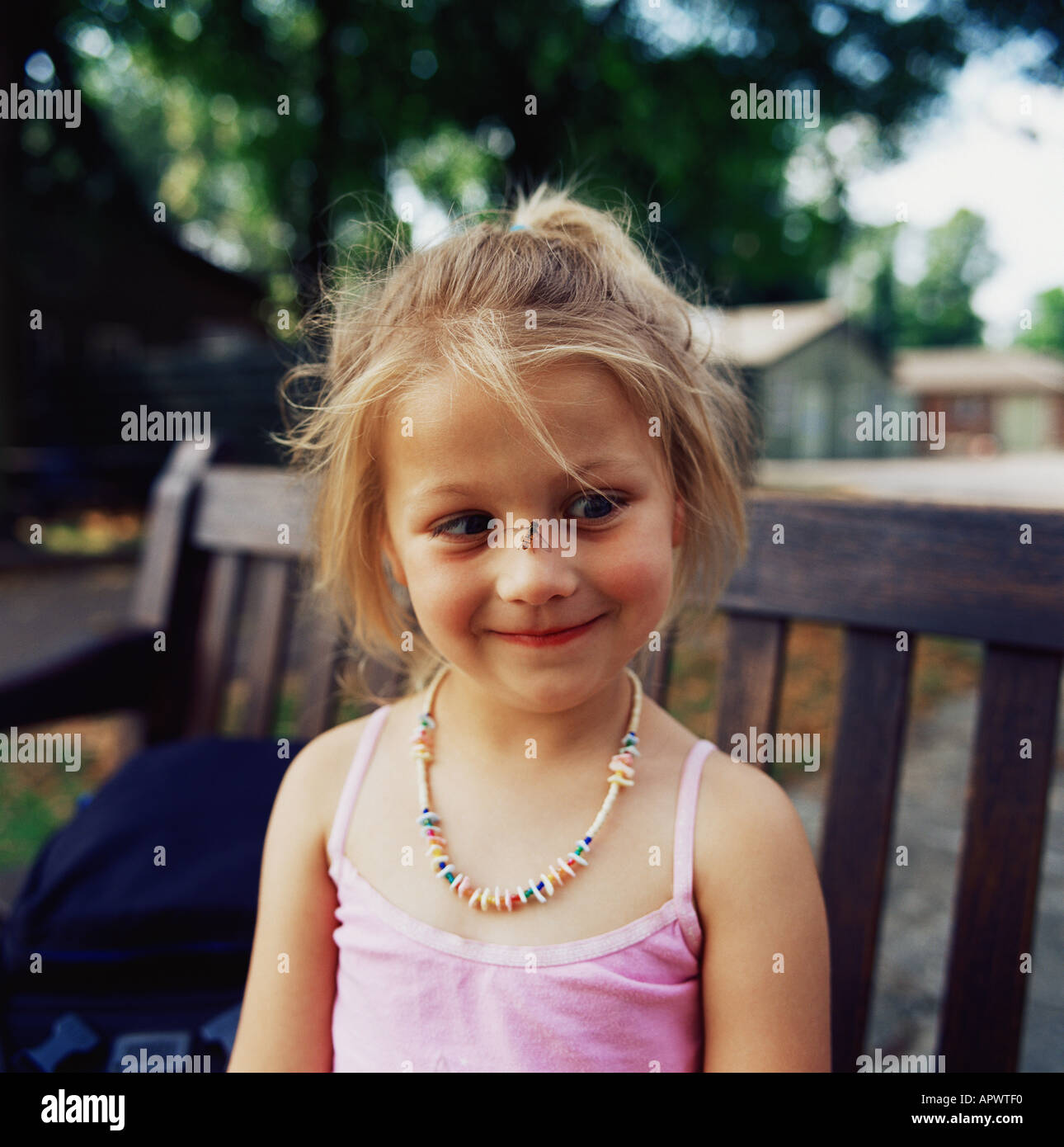 Girl with a hover fly on her nose Stock Photo - Alamy