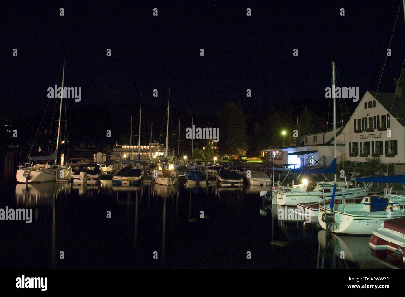 Enjoying the serenity of a calm harbor on a warm summer evening Stock ...