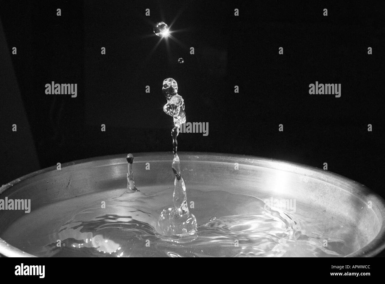 A Water Drop catching the Light Stock Photo - Alamy