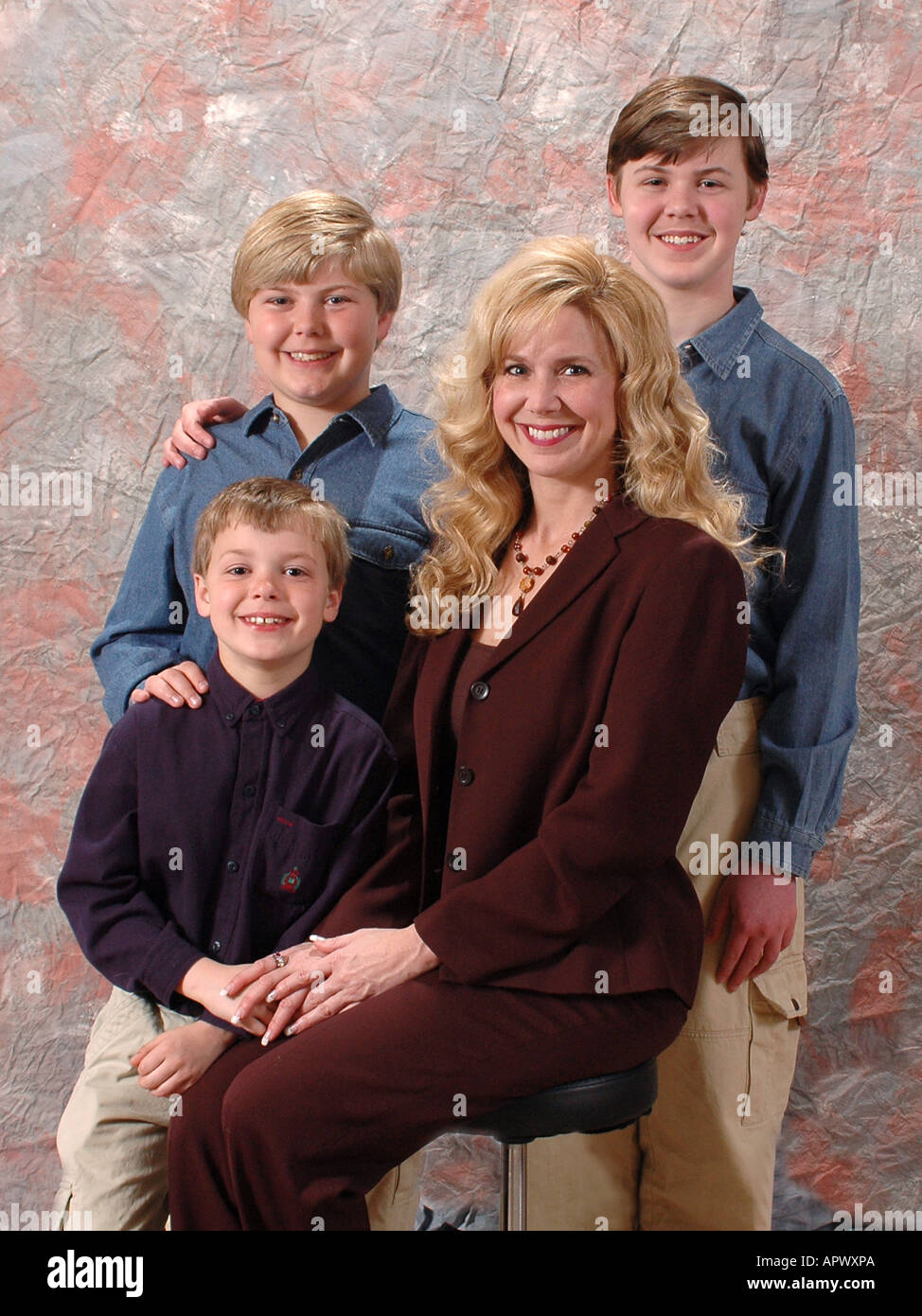 Family portrait with Mom and three boys Stock Photo - Alamy