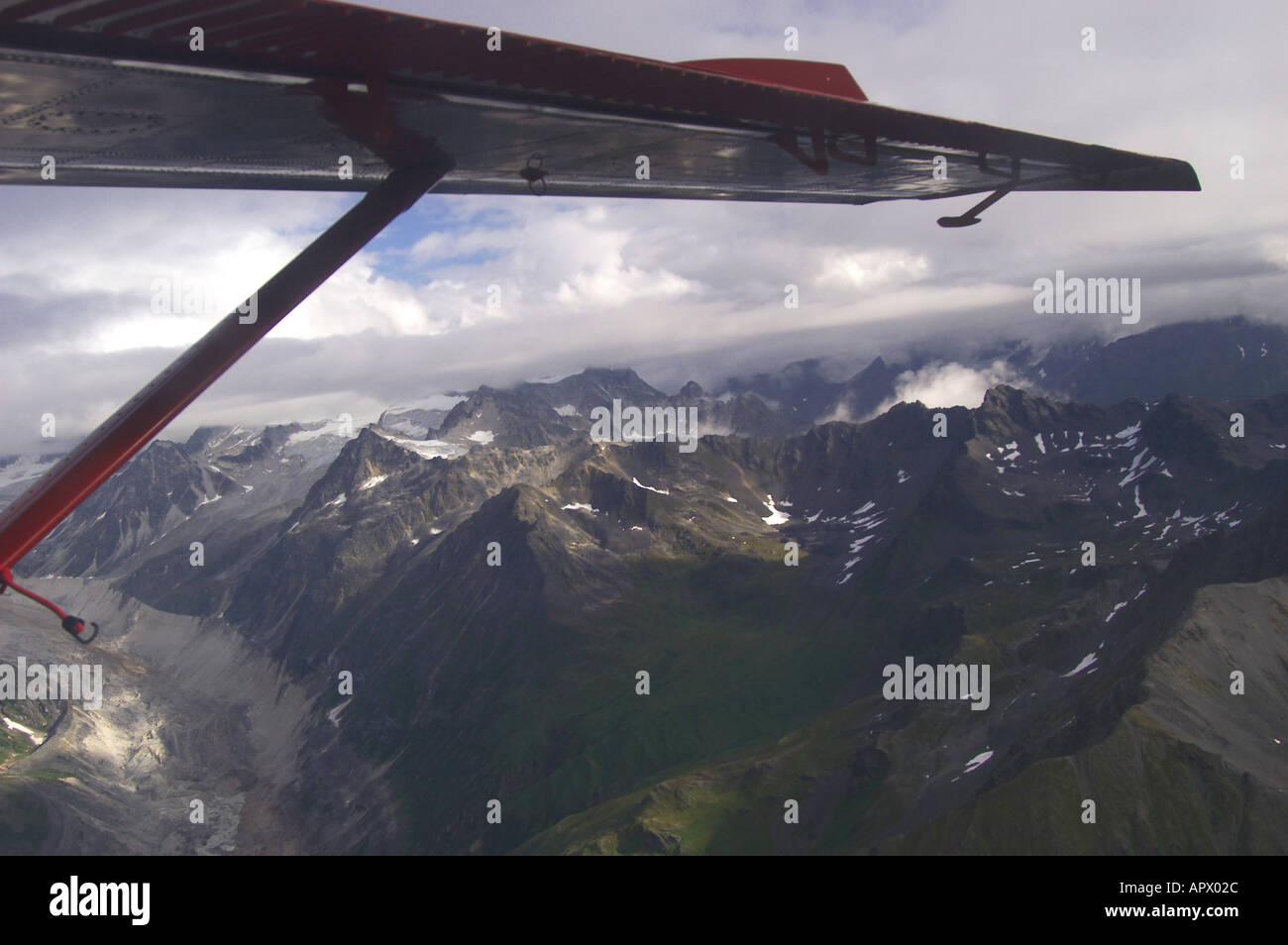bush plane over Alaska range Stock Photo - Alamy