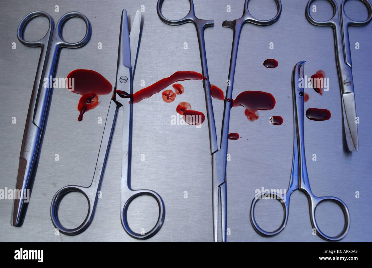 surgical instruments set for an operation with blood on them Stock ...