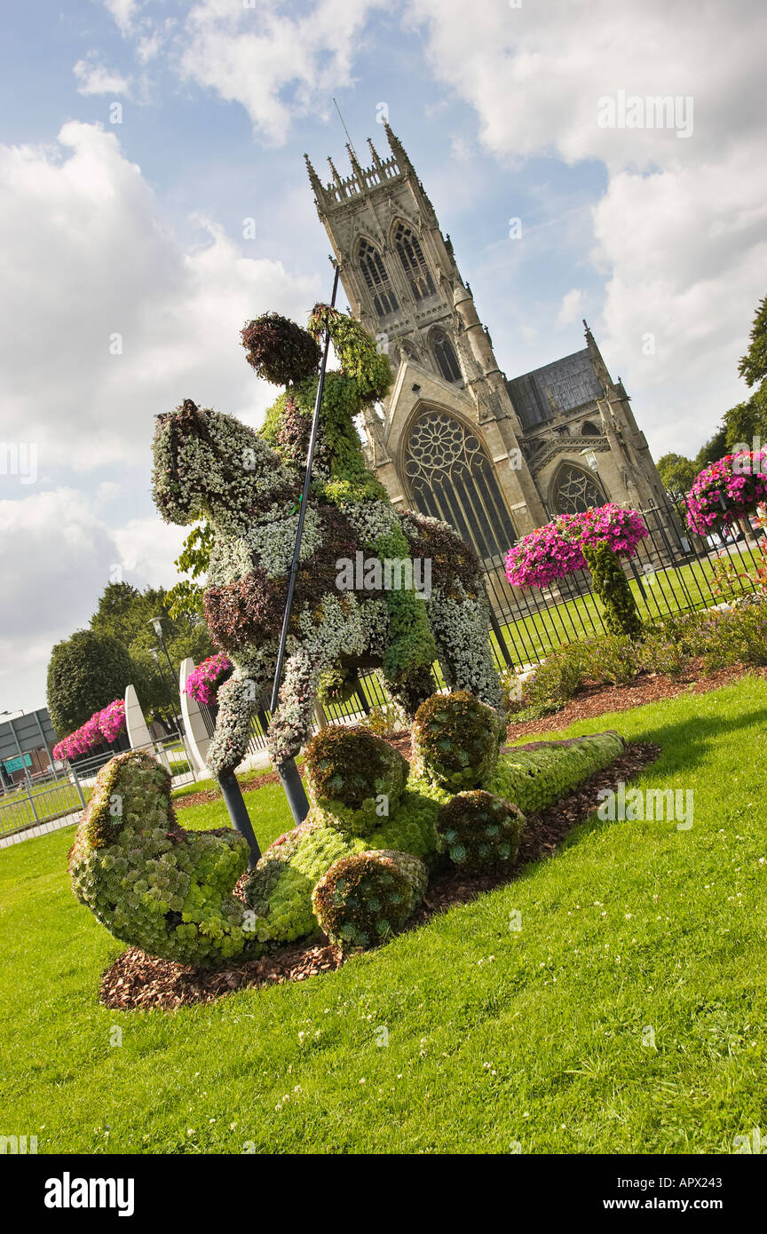 Topiary floral display of St George and The Dragon outside the Minster ...