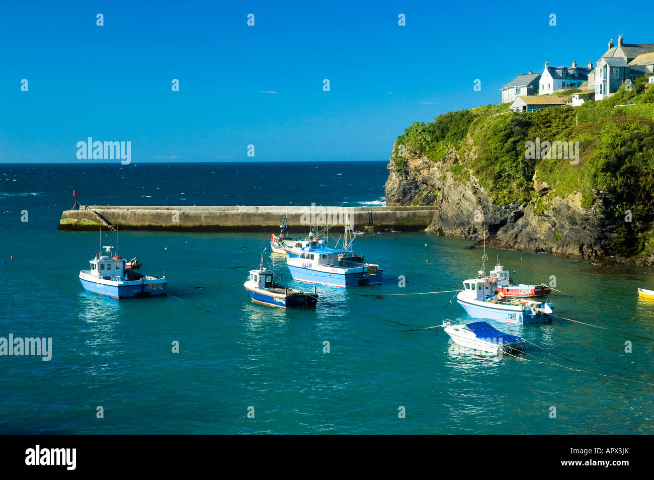 Port Isaac harbour Cornwall. Port Isaac has a small fishing industry ...