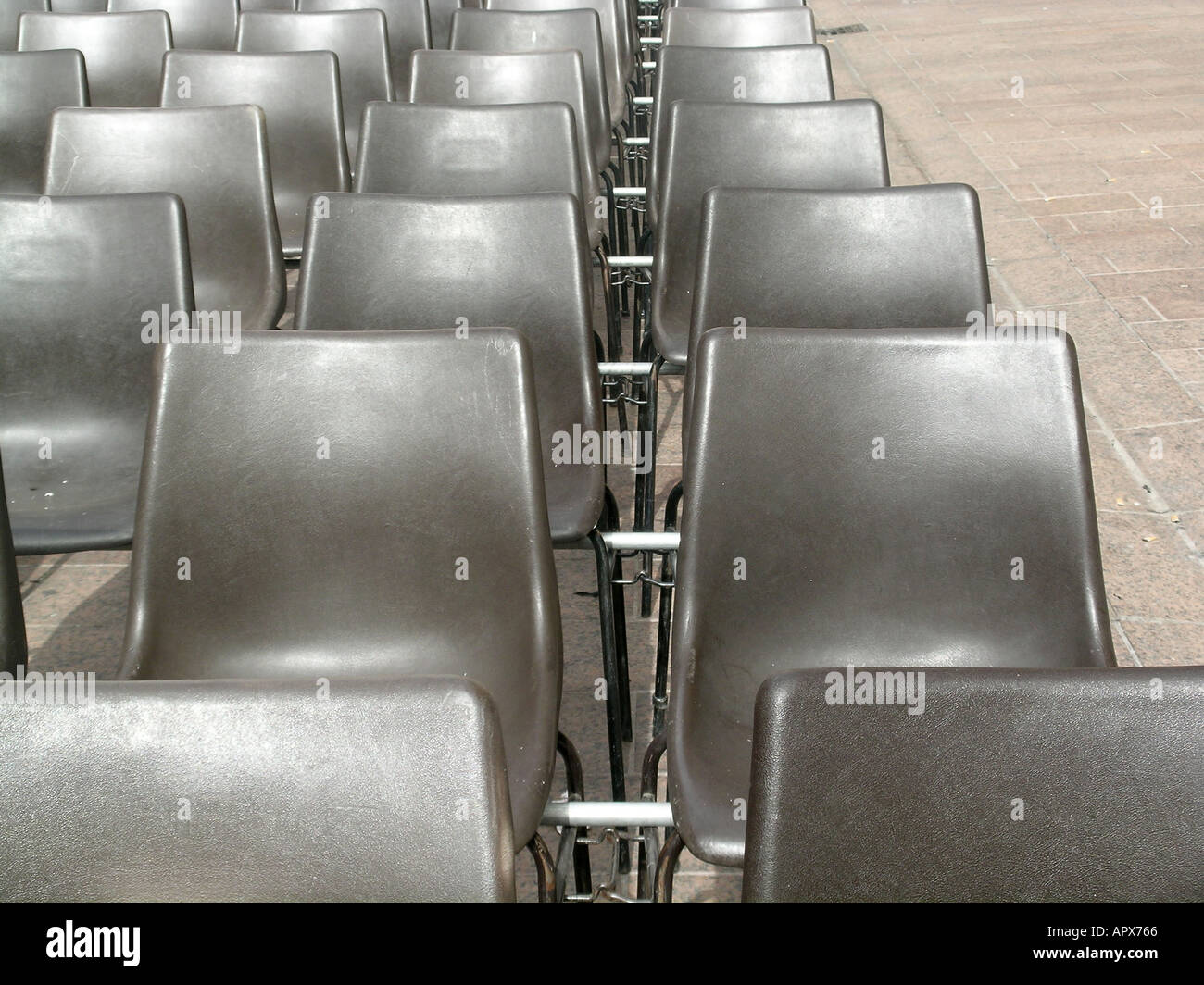 Joined chairs hi-res stock photography and images - Alamy