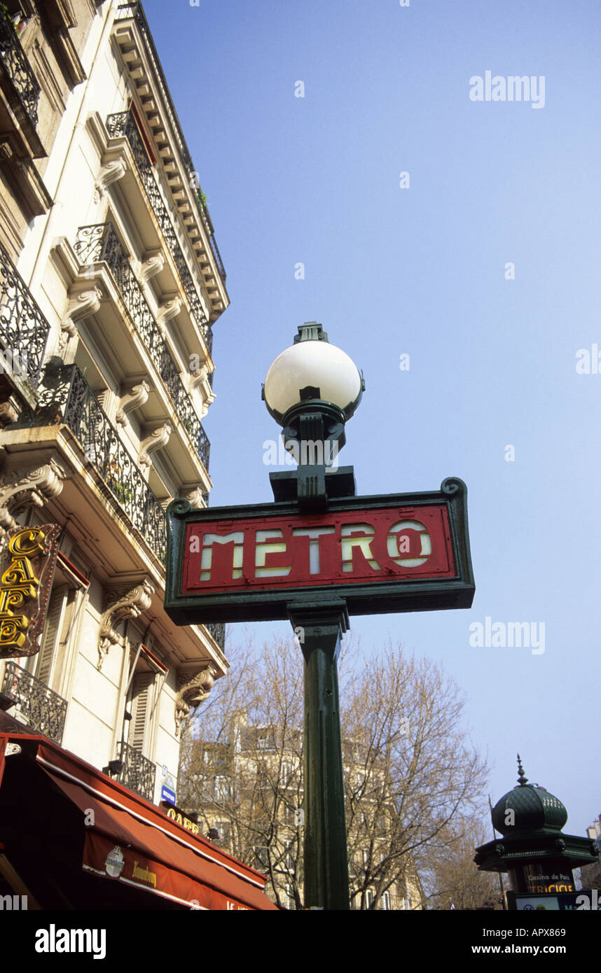 A Paris Metro sign and lamp post France Stock Photo - Alamy