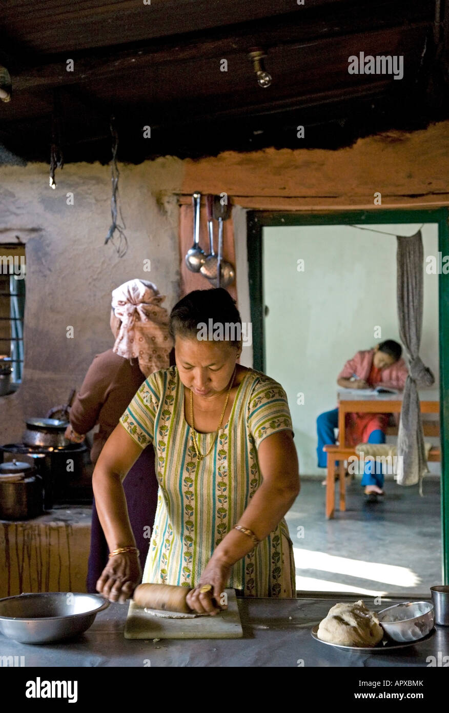 Woman making bread. Birethanti village. Annapurna circuit trek. Nepal ...