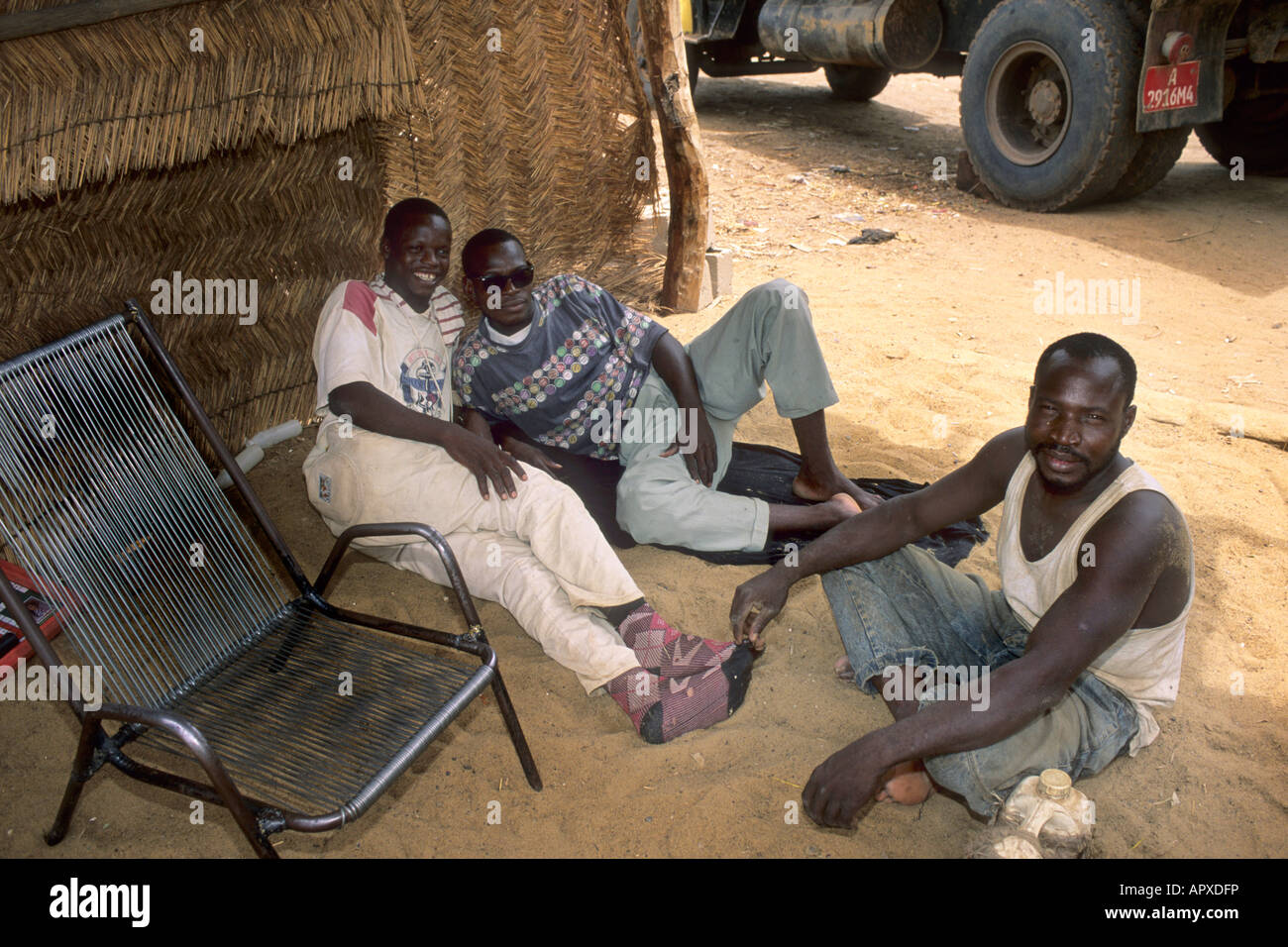 Truck drivers resting in the shade Stock Photo - Alamy