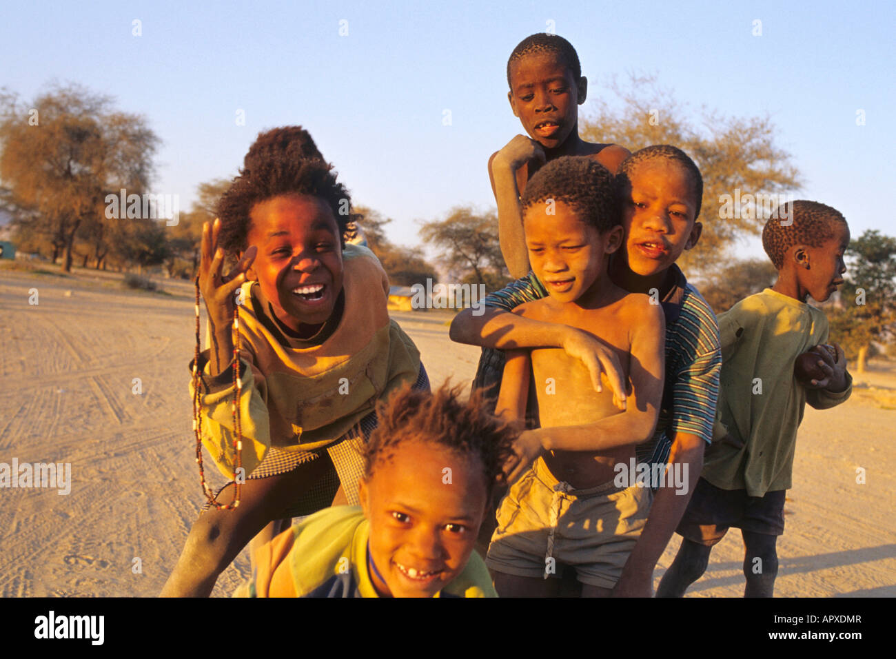 A group of local boys at play in the road in Sesfontein Stock Photo - Alamy