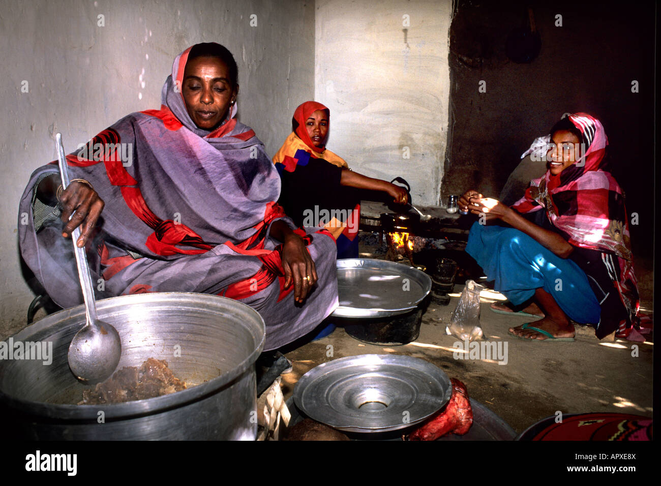 Nubian woman cooking hi-res stock photography and images - Alamy