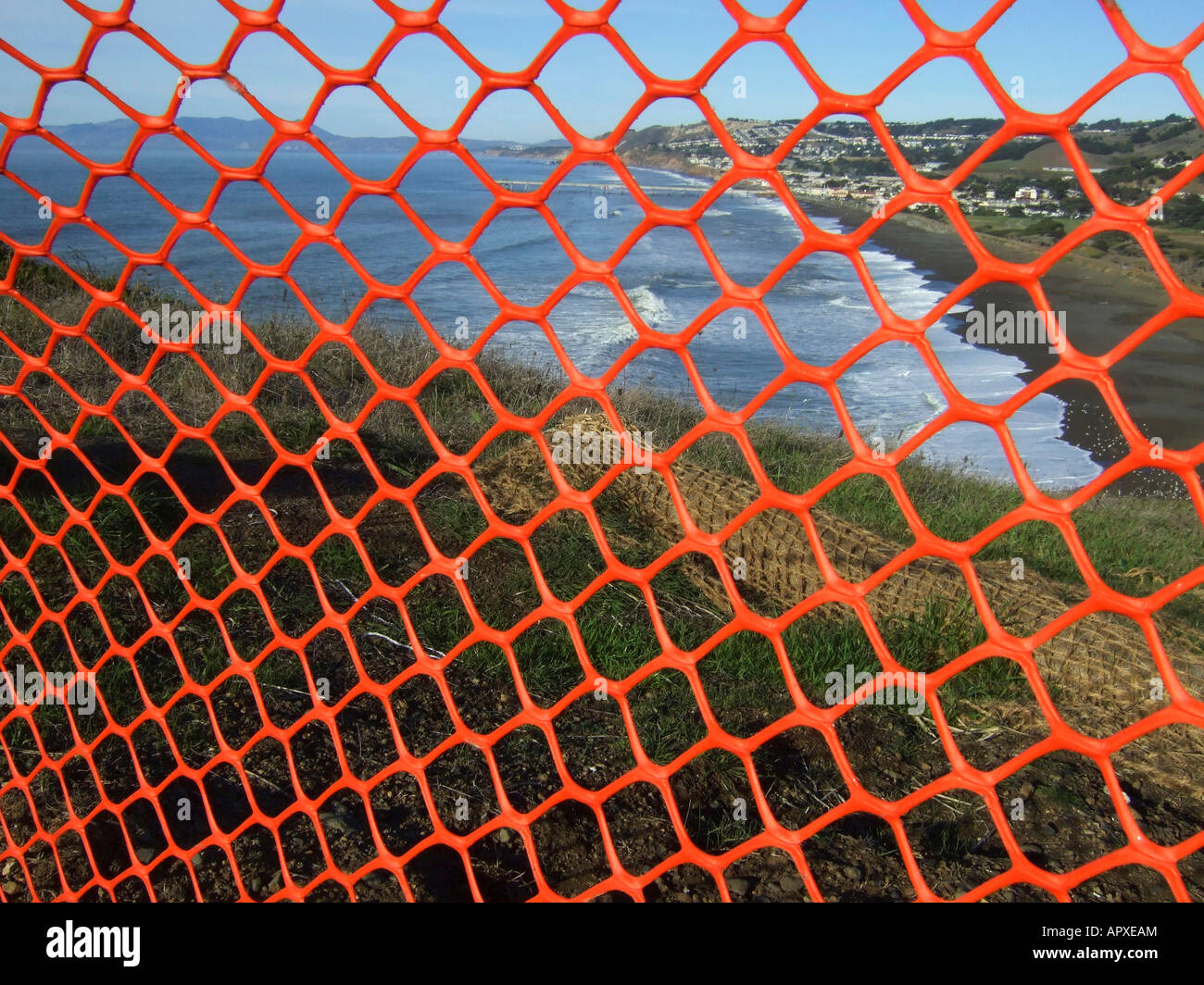 "red plastic fence, Pacifica, California Stock Photo - Alamy