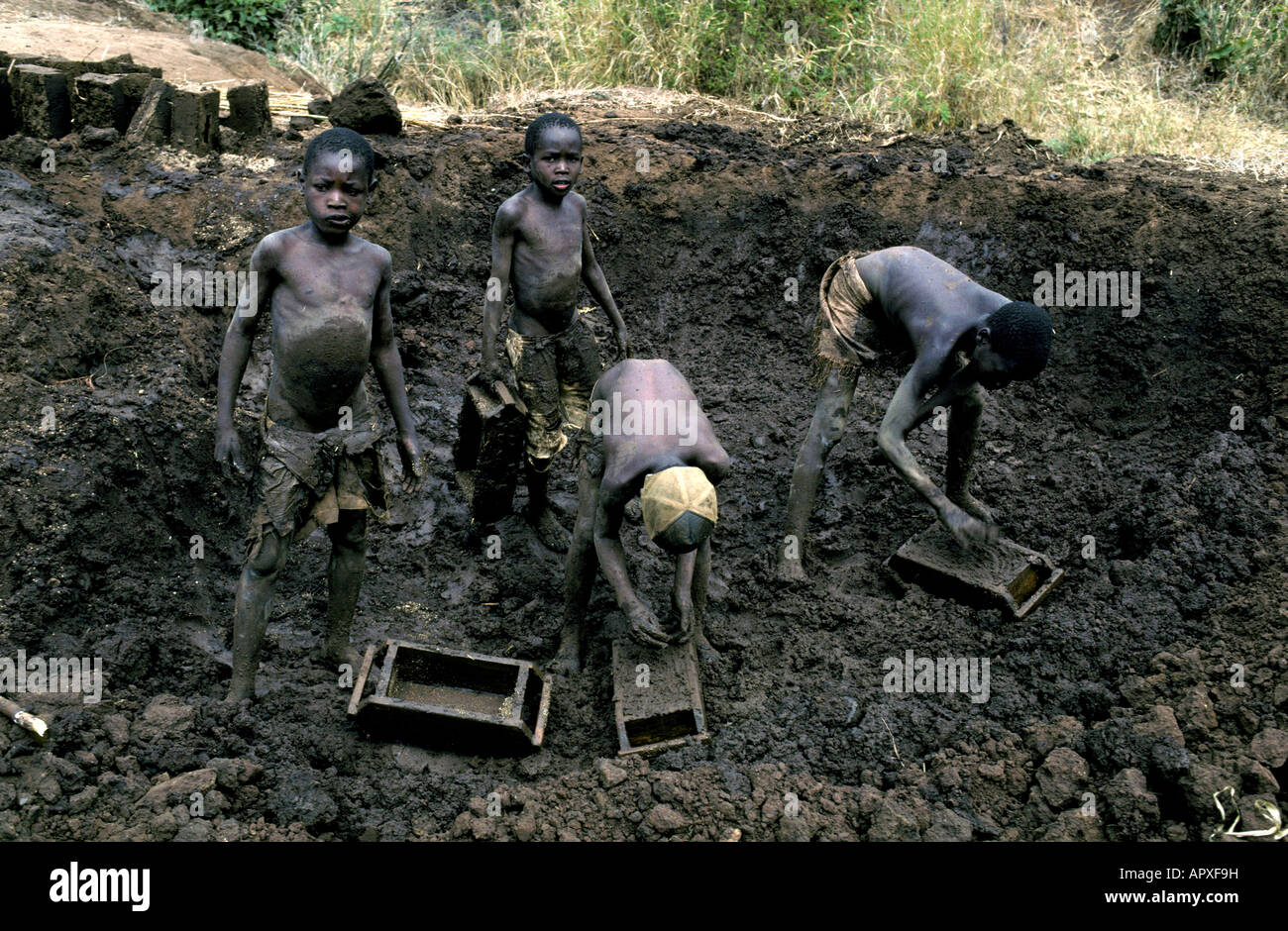 Children working making mud bricks Stock Photo - Alamy