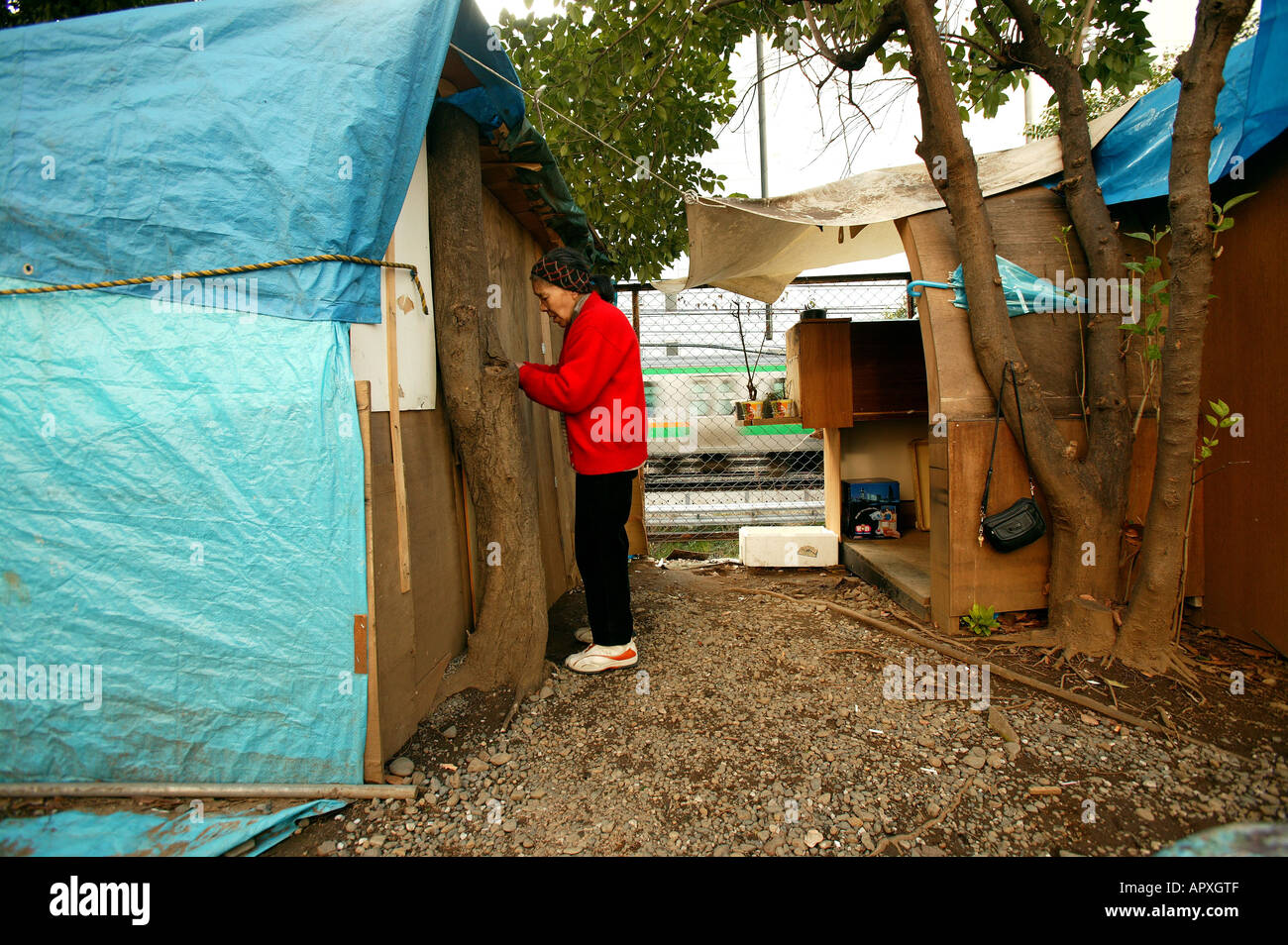 Homeless living boxes in tokyo hi-res stock photography and images - Alamy