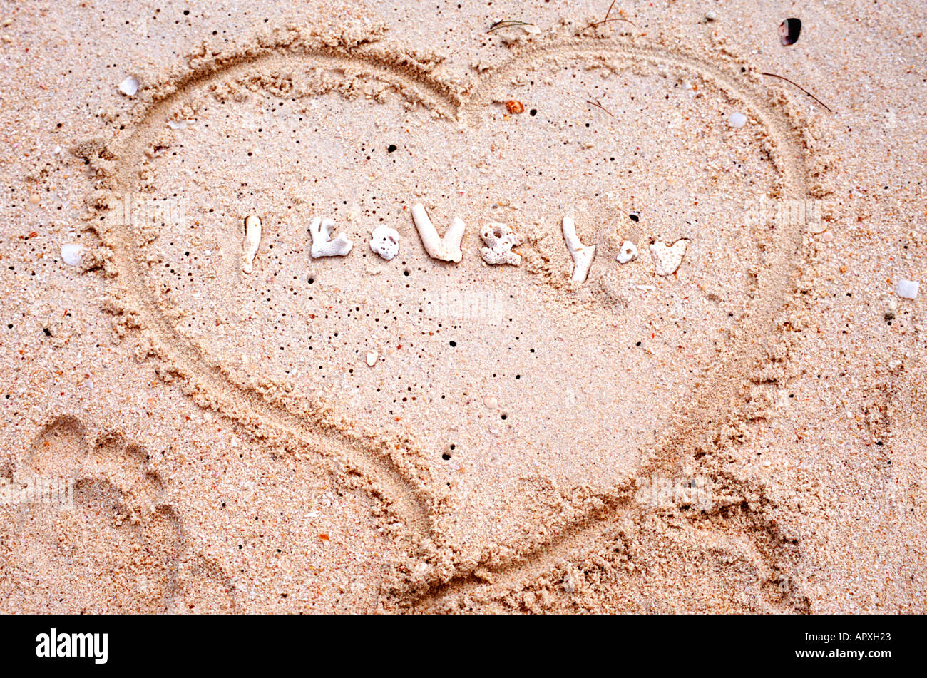 Love letters in the sand Stock Photo - Alamy