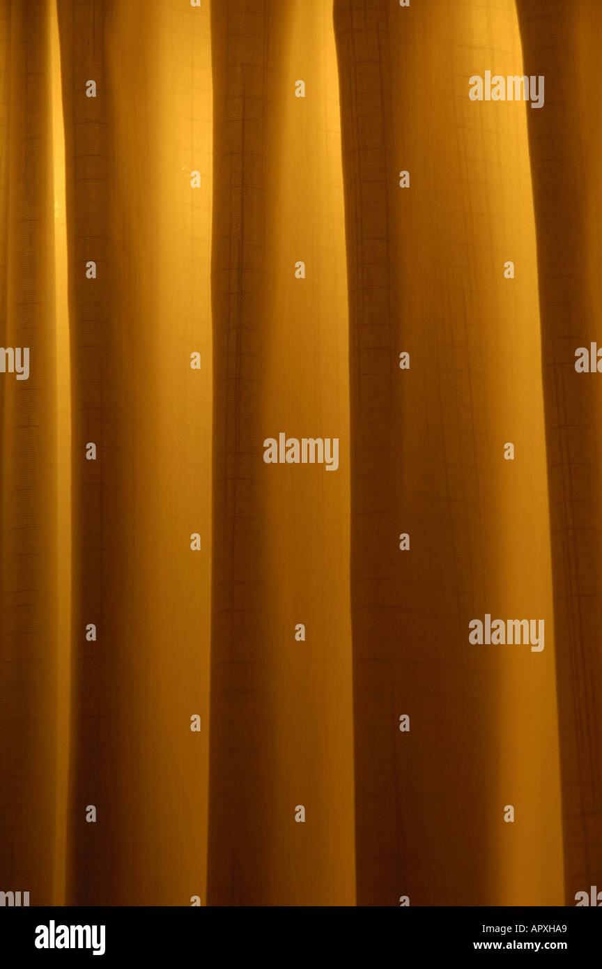 Abstract of yellow curtain Stock Photo - Alamy