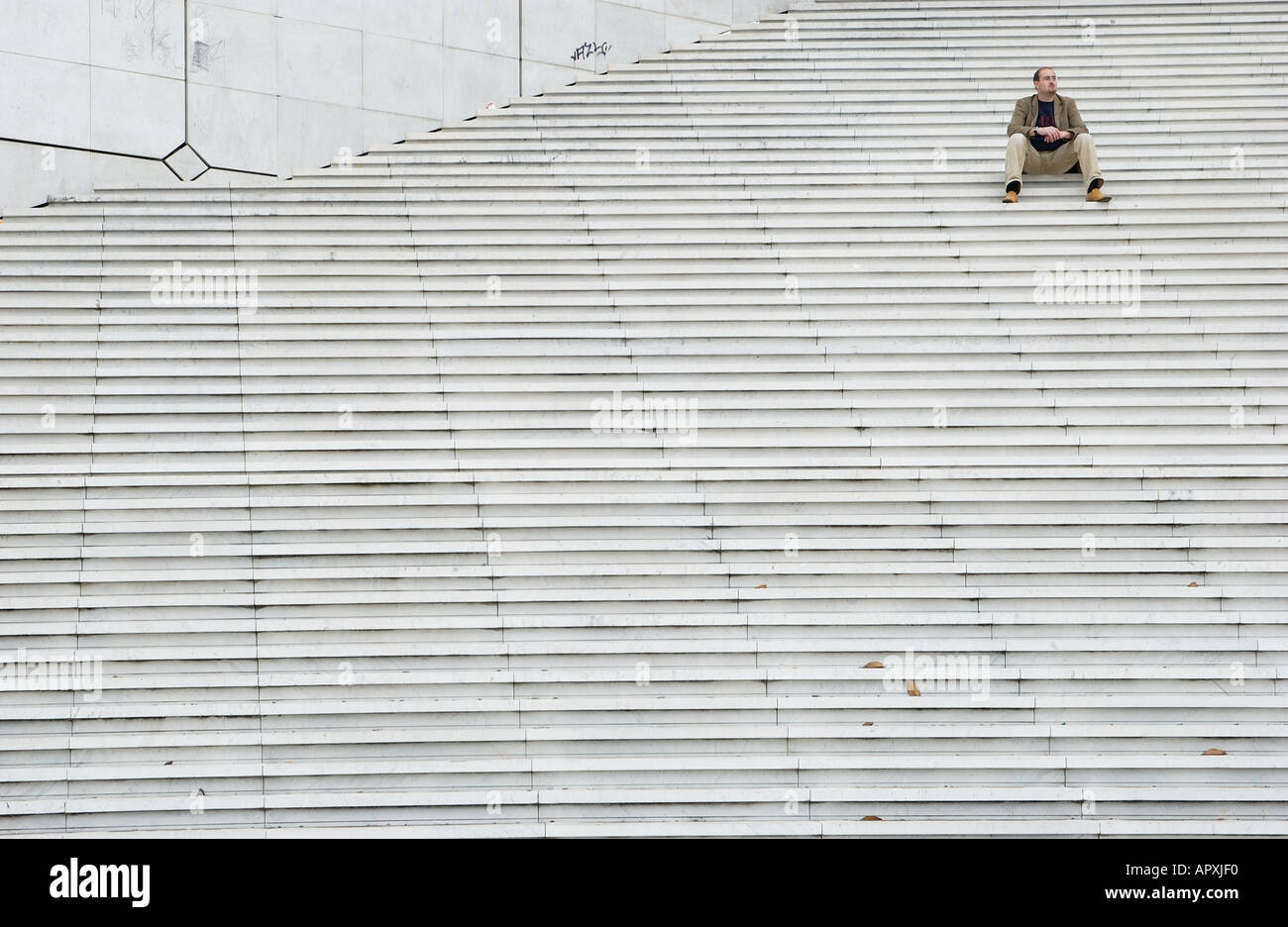 Man on steps Stock Photo - Alamy
