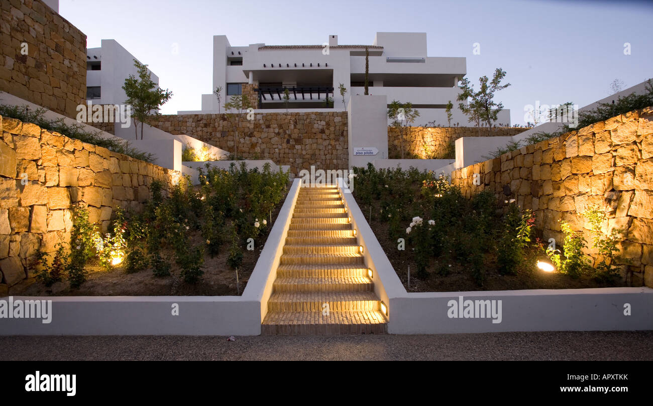 Modern apartment block entrance at dusk Stock Photo - Alamy