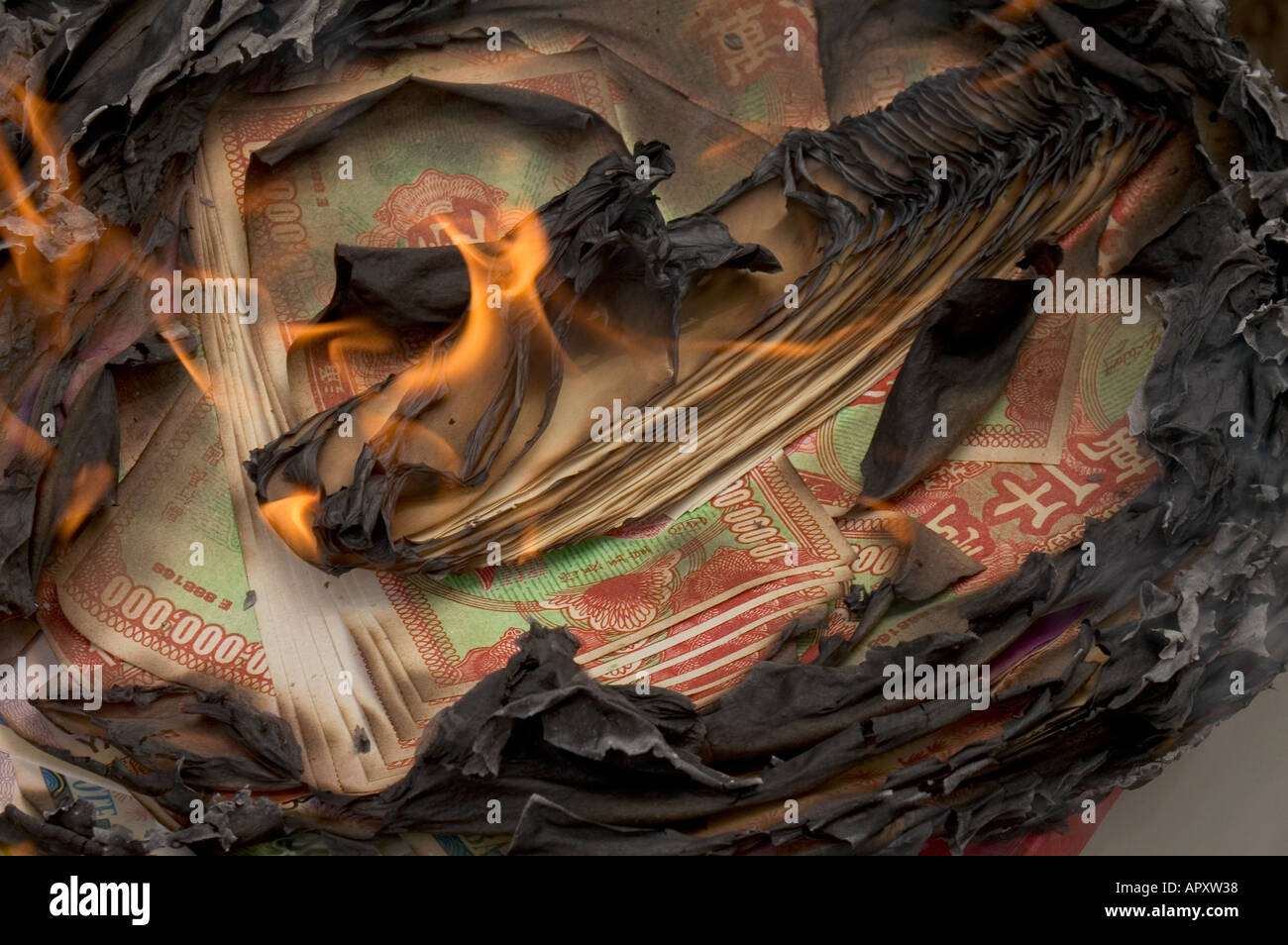 Burning of "hell money" for the ancestors during the Qing Ming Festival ...