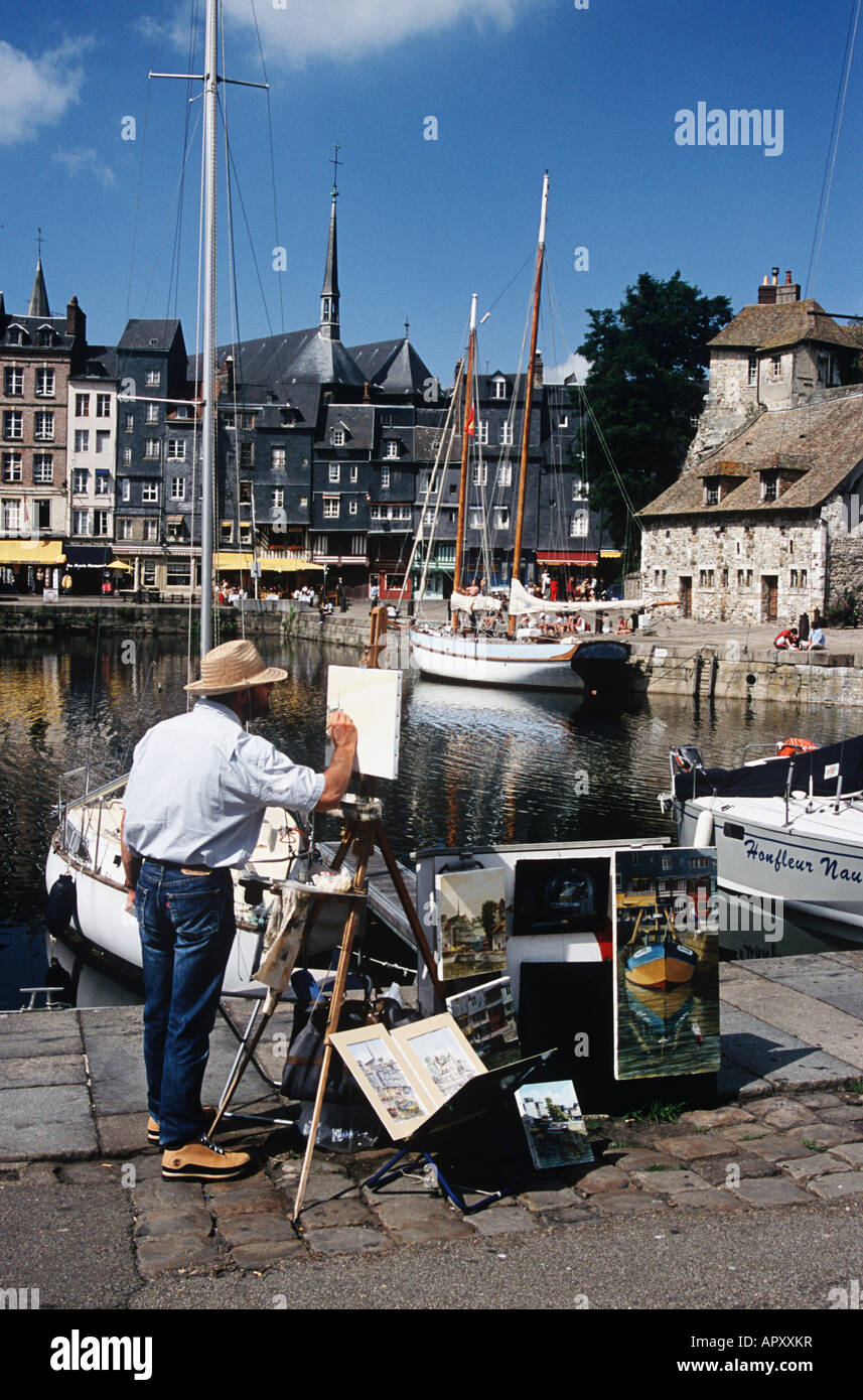 Artist painting, yacht moored, Honfleur Harbour, Honfleur, Normandy ...