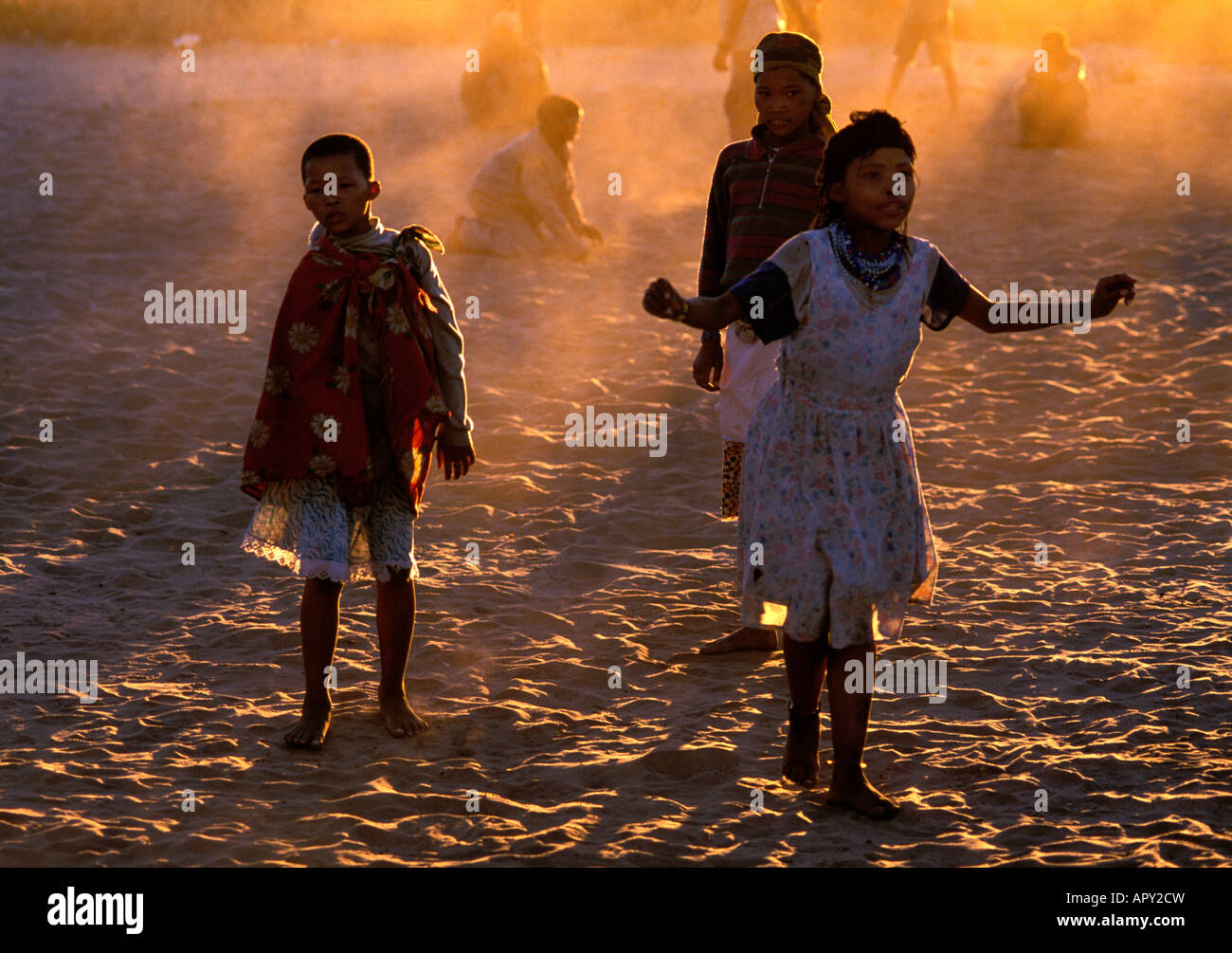 Bushman children playing in the sand Den ui village Bushmanland Namibia ...