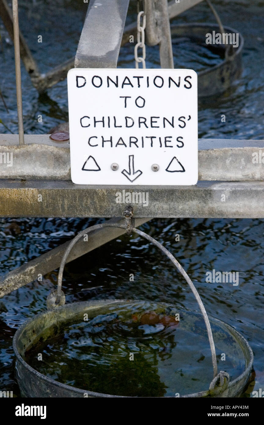 Childrens' Charities Donation Bucket At Southwold Pier Stock Photo - Alamy