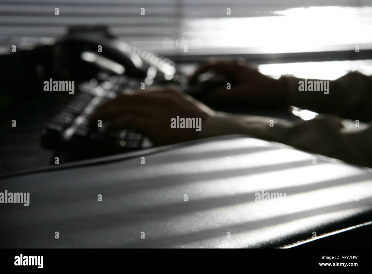 Office working typing on keyboard Stock Photo - Alamy