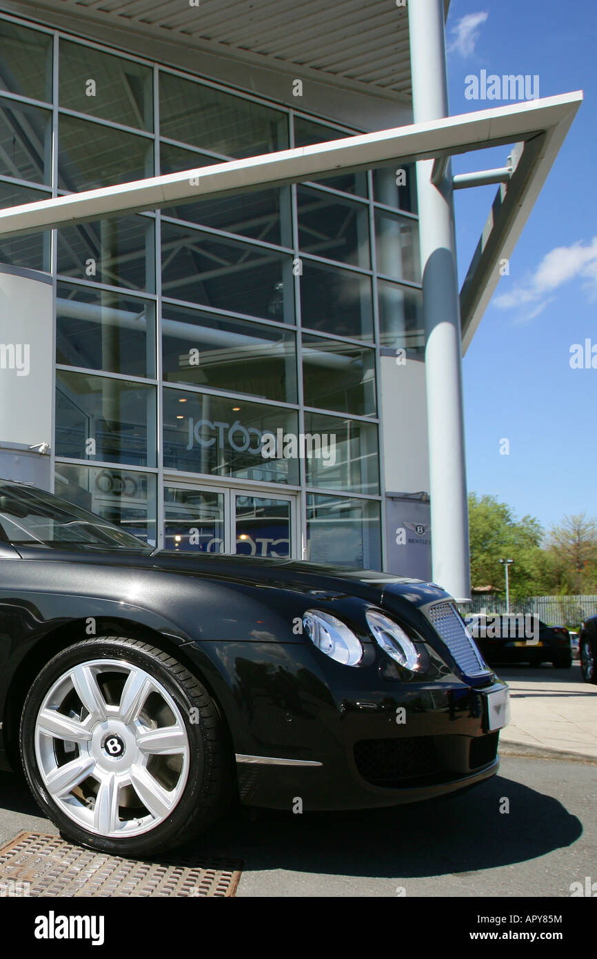 Bentley car in dealer garage Stock Photo - Alamy