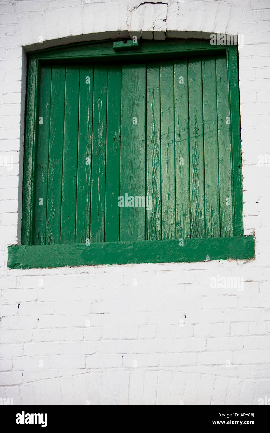 white wall green window wooden frame Stock Photo - Alamy