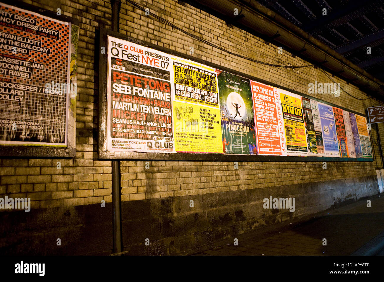 Adverts on wall in Leeds Stock Photo - Alamy