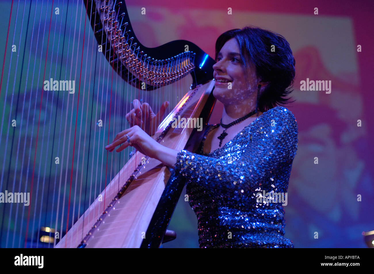 Catrin Finch, welsh woman harpist playing her traditional harp in ...