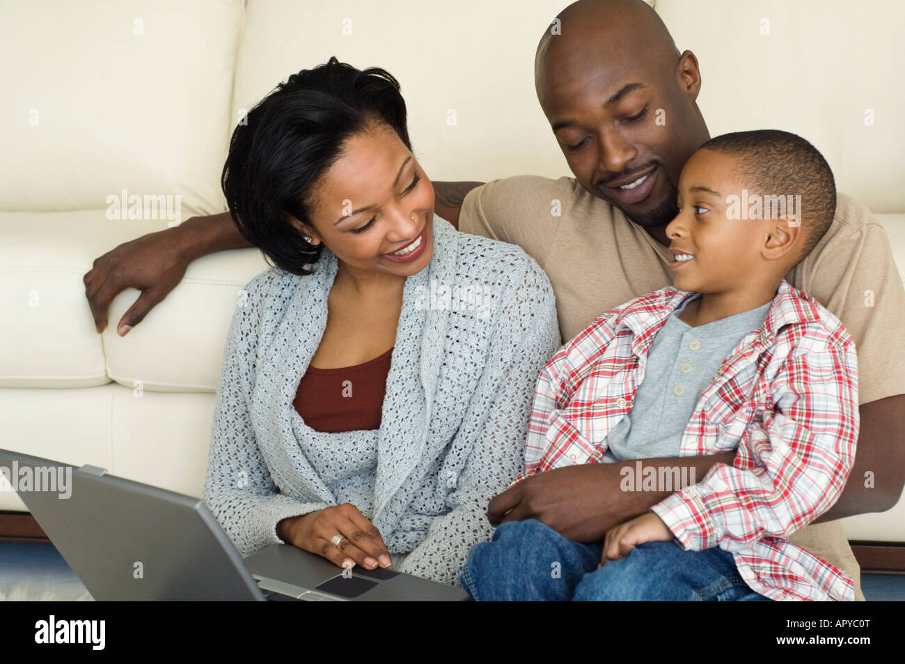 African family smiling at each other Stock Photo - Alamy