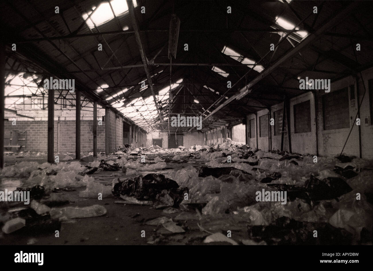 Litter in a disused factory, derelict building, Ancoats, Manchester, UK ...