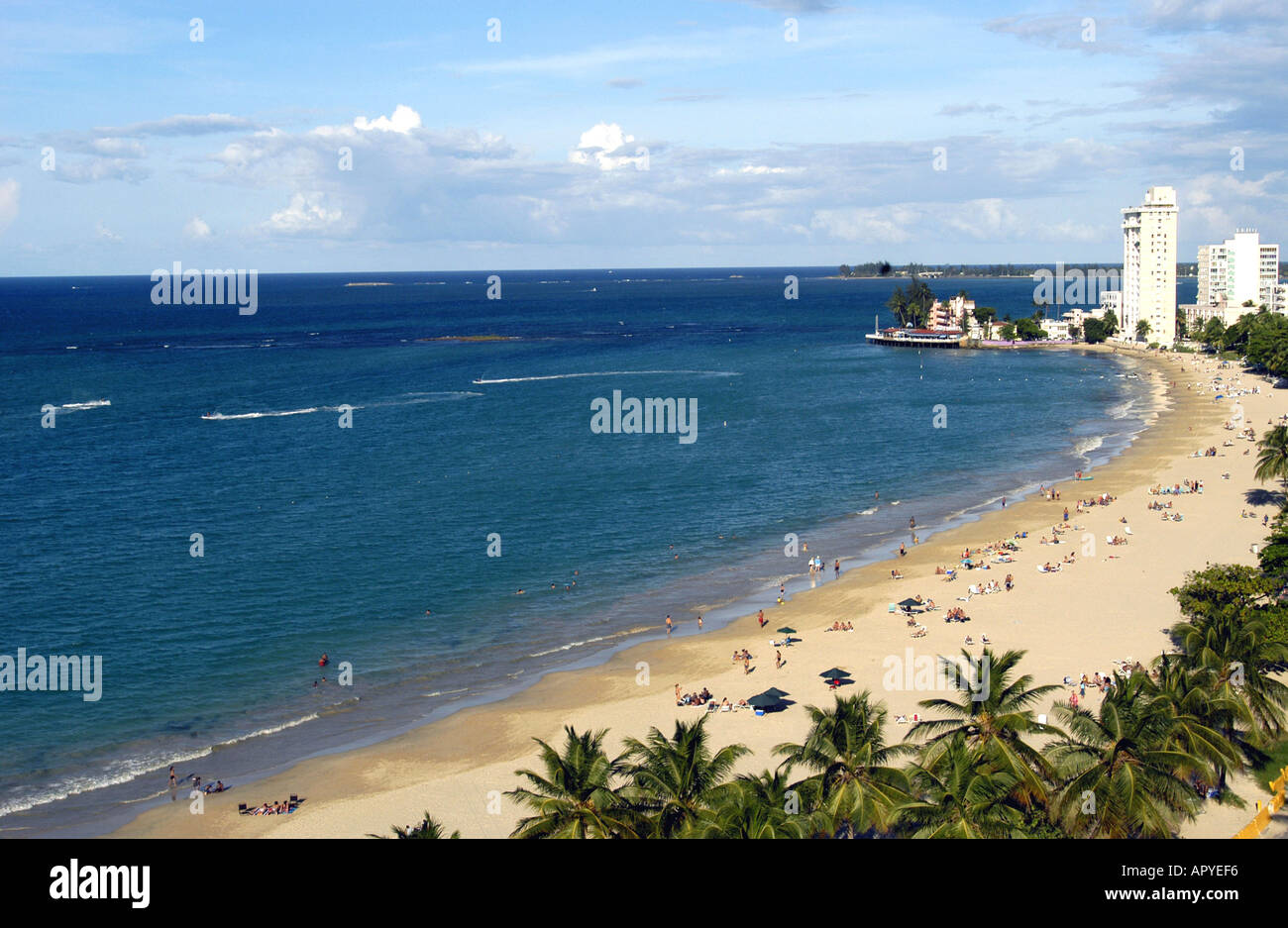 aerial above San Juan Puerto Rico overview of Isla Verde Beach and deep ...