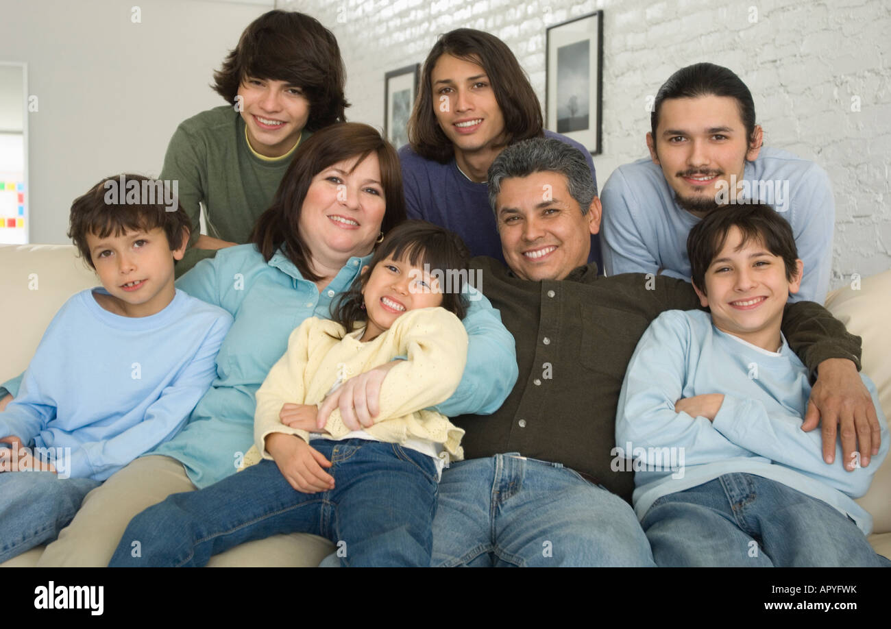 Portrait of Hispanic family on sofa Stock Photo - Alamy
