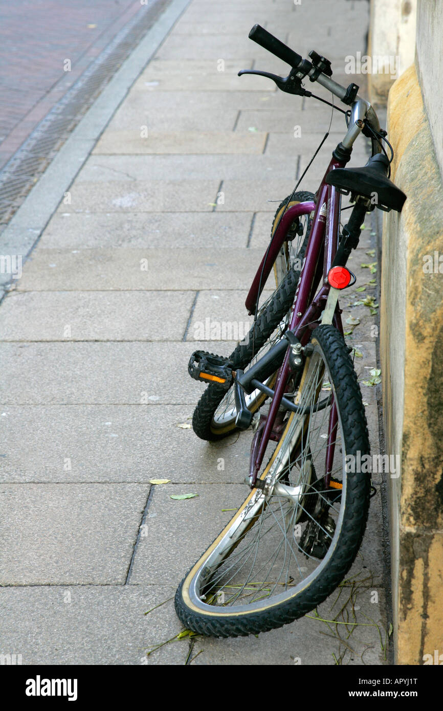 Broken bicycles in street vandalism student transport Stock Photo - Alamy