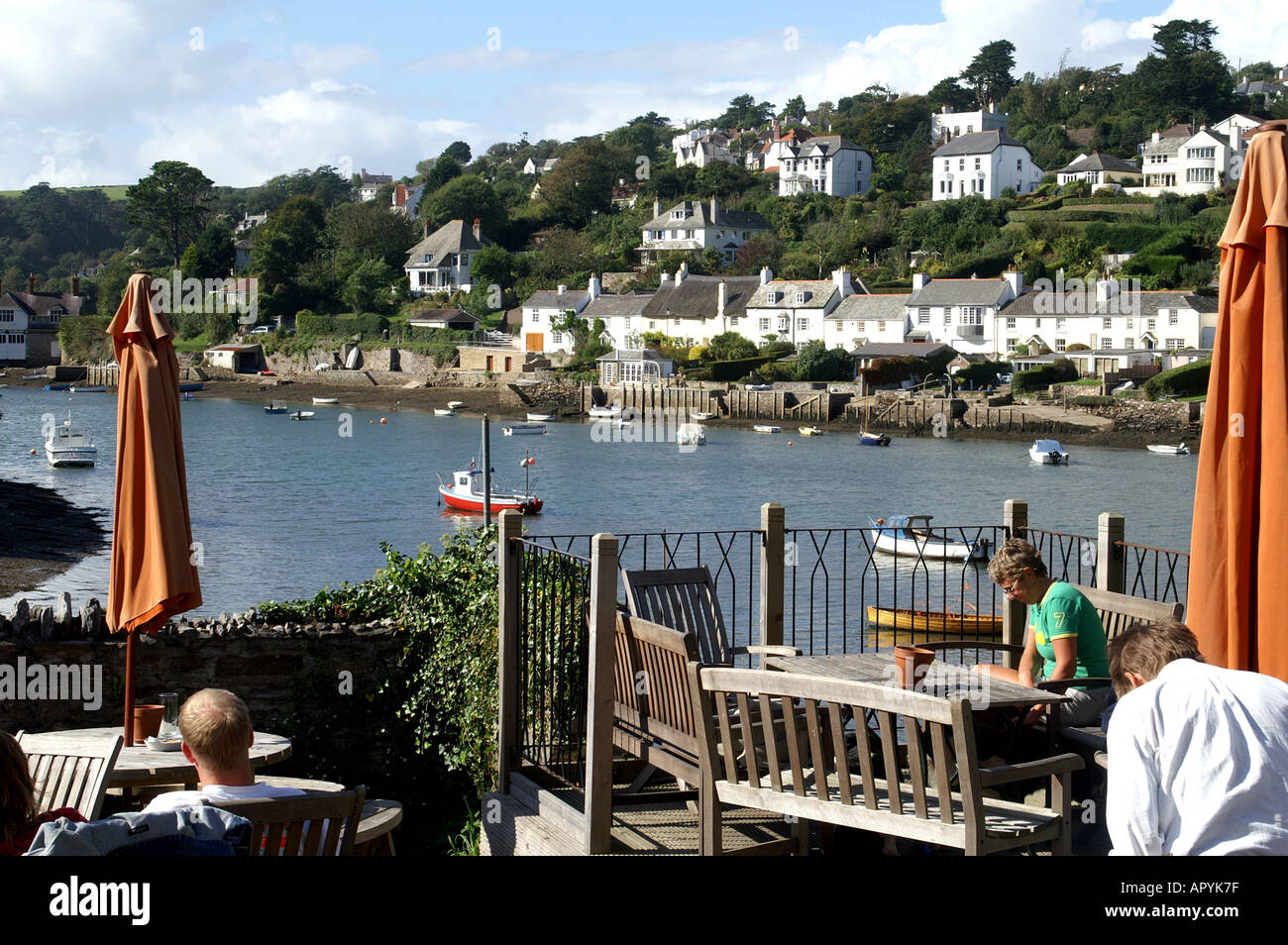 The terrace outside the Swan Inn Noss Mayo Devon England Stock Photo ...
